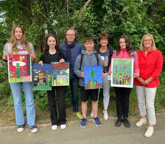 Onlinelesen - Alexander Schneider gewinnt Plakatwettbewerb der IGS Solms